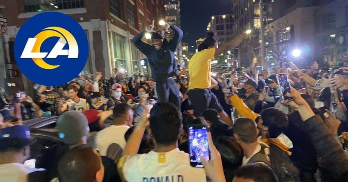 Rams fans lit fireworks inside bus, hop on car roof after team's ...