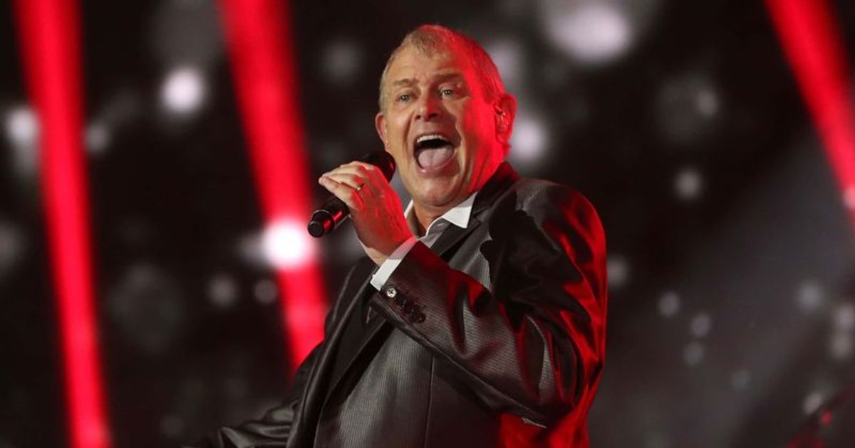 'Reminiscing' singer John Farnham may NEVER sing again after most of ...