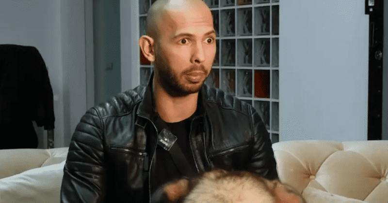 Andrew Tate makes mystery hand signal as he arrives in court for new ...