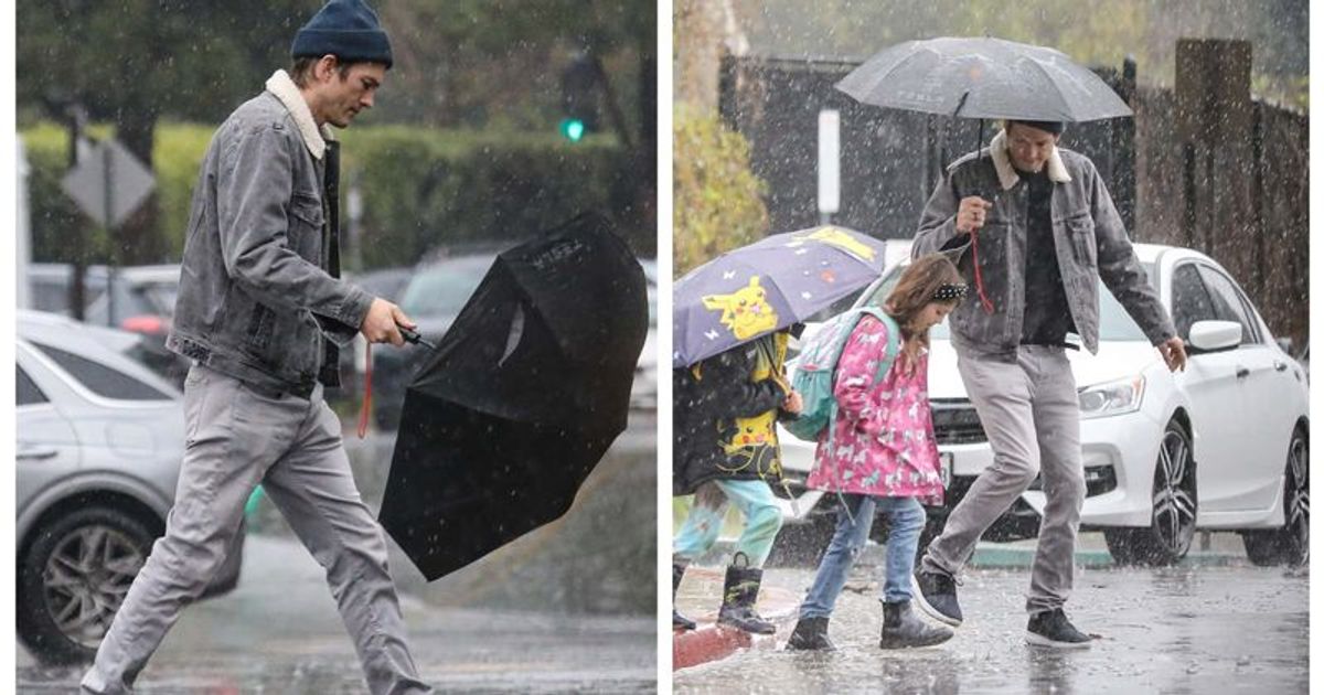 Doting father Ashton Kutcher braves the rain for children | MEAWW