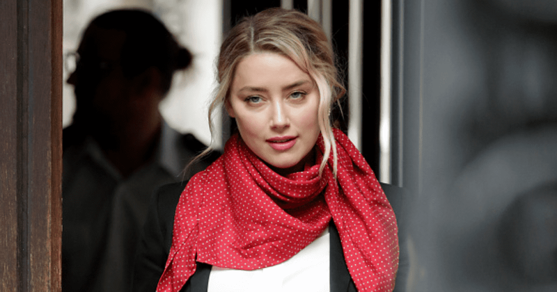 Amber Heard discusses new film 'In The Fire' as she makes first red ...